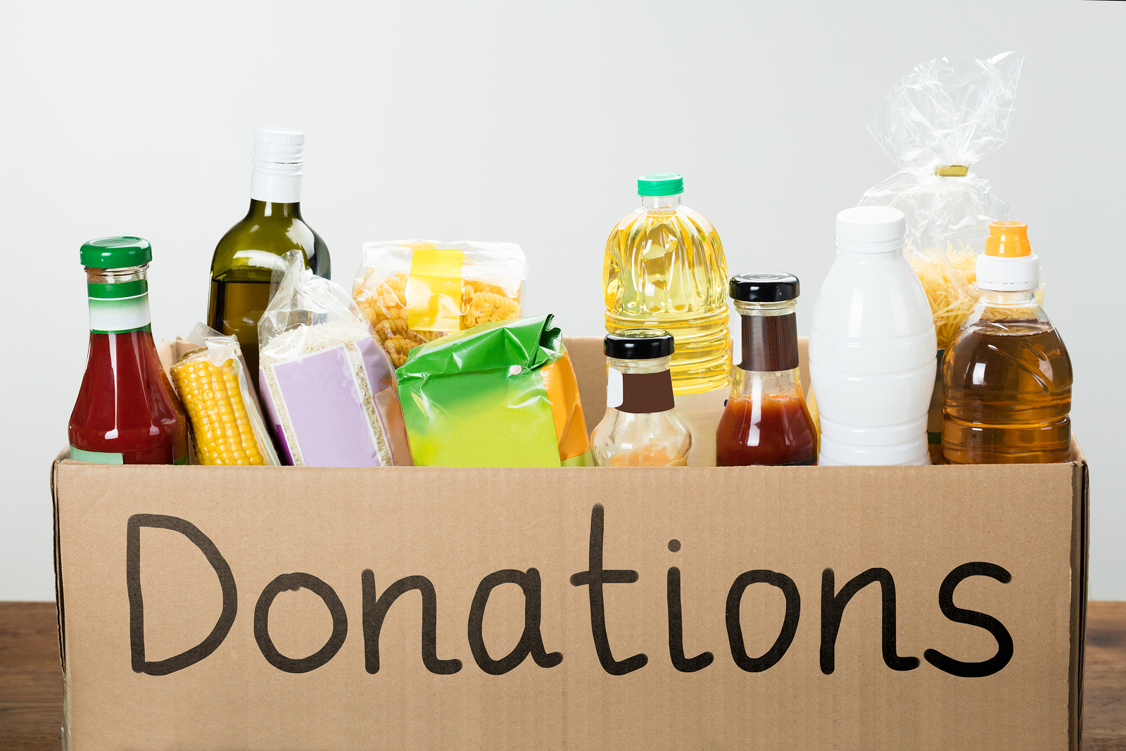Close up Of A Donation Box With Various Food Items In It T L
